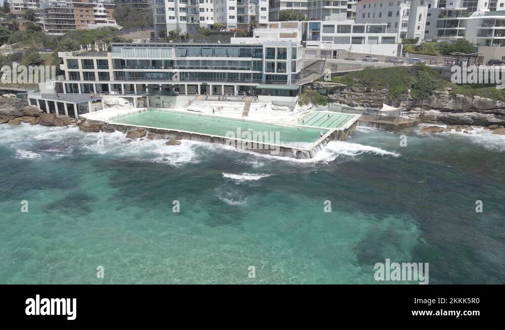 Tourists At Bondi Icebergs Club With A View Of Icebergs Pool And Beach ...