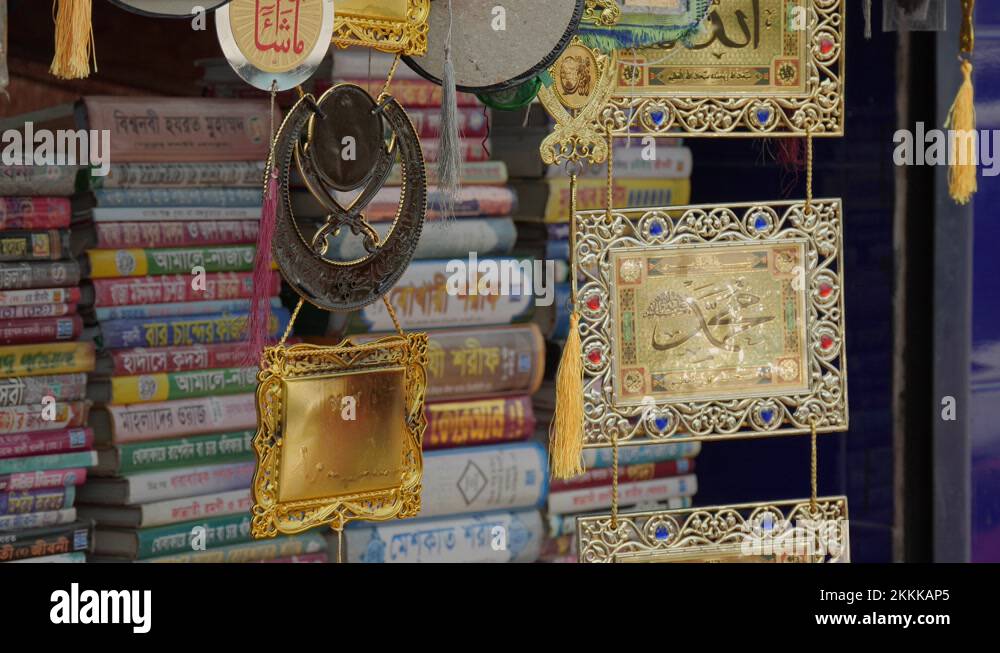Static close shot for Indian book store with hanged golden shiny ...