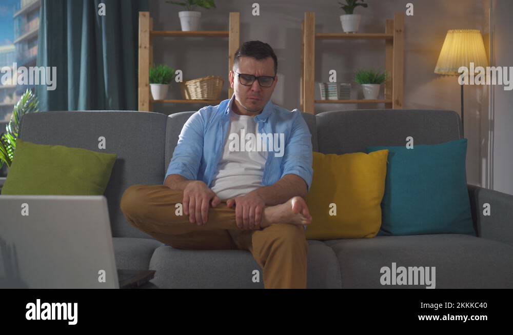 Man stinking feet Stock Videos & Footage - HD and 4K Video Clips - Alamy