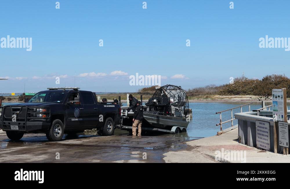 Game Warden pulling air boat out of water after recusing cold stunned ...