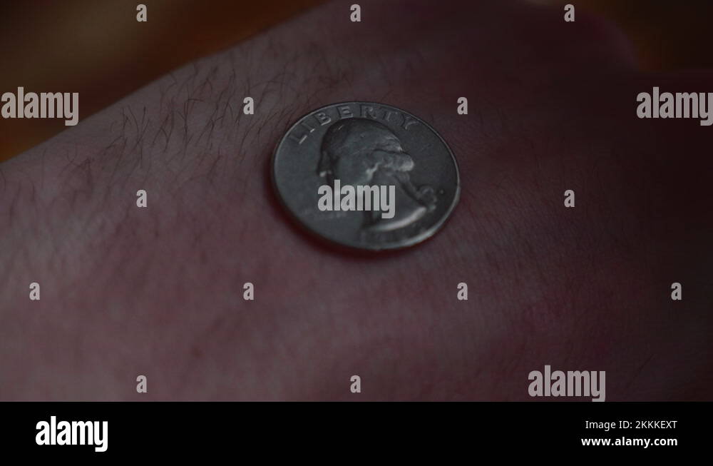 Revealing Coin Tossed At The Back Of A Hand With Head Facing Up. close ...
