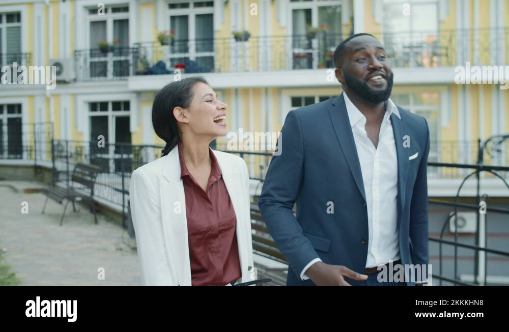 Young professionals walking laughing Stock Videos & Footage - HD and 4K ...