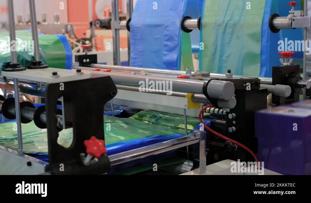 Automatic plastic bag making, cutting, sealing machine during work at ...