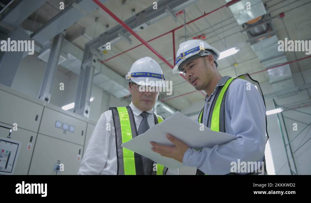 Engineer concept of 4k Resolution. The employee is checking the ...