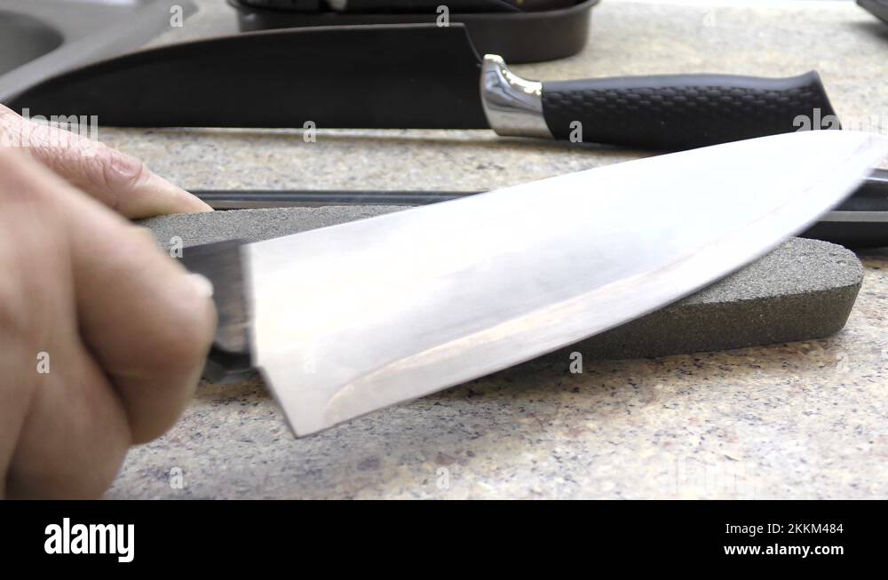 Sharpening knife on whetstone hand Stock Videos & Footage - HD and 4K ...