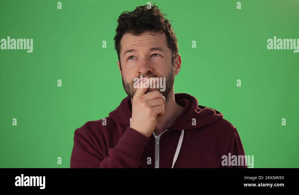 Close up head shot portrait man applicant on green screen chroma key ...