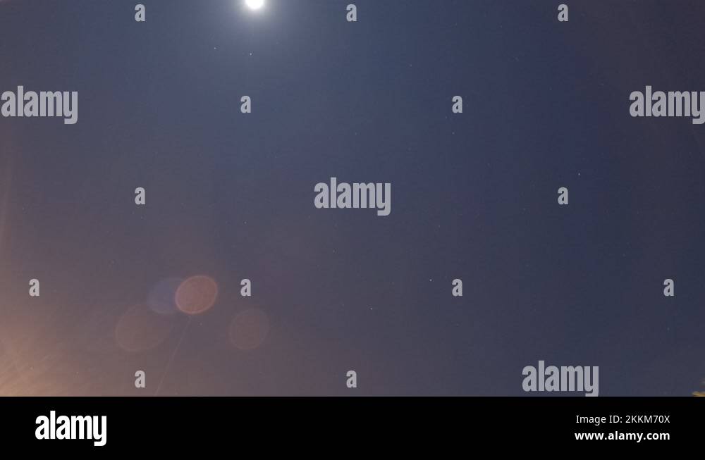 Bright moon light n stars with bokeh lens flare on dark night sky Stock ...