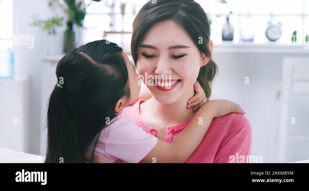 Daughter kiss mom tenderly Stock Videos & Footage - HD and 4K Video ...