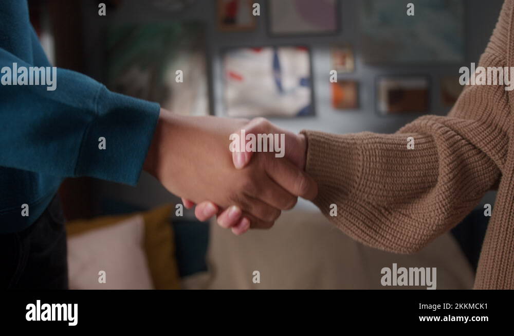 Interracial handshake on office background, black and white hands Stock ...