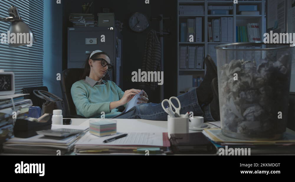Frustrated employee throwing crumpled paper in the trash can Stock ...