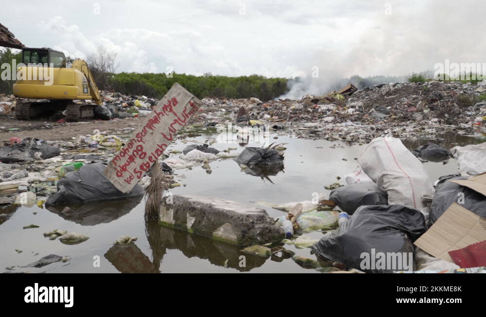 Pan of Smoldering Trash Dump - Nusa Penida & Lombok, Bali Stock Video ...