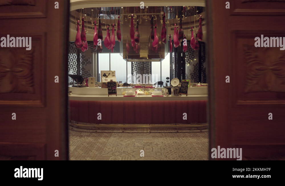 Sliding wooden door opening to restaurant with buffet at hotel - Suzhou ...