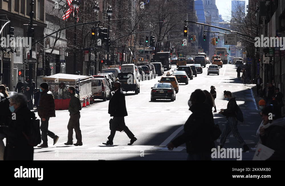 People wearing face mask cross Stock Videos & Footage - HD and 4K Video ...