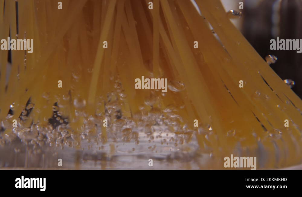Pouring spaghetti Stock Videos & Footage - HD and 4K Video Clips - Alamy