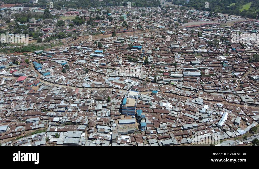 Poor people living in the populated slums of Kibera Kenya. drone view ...