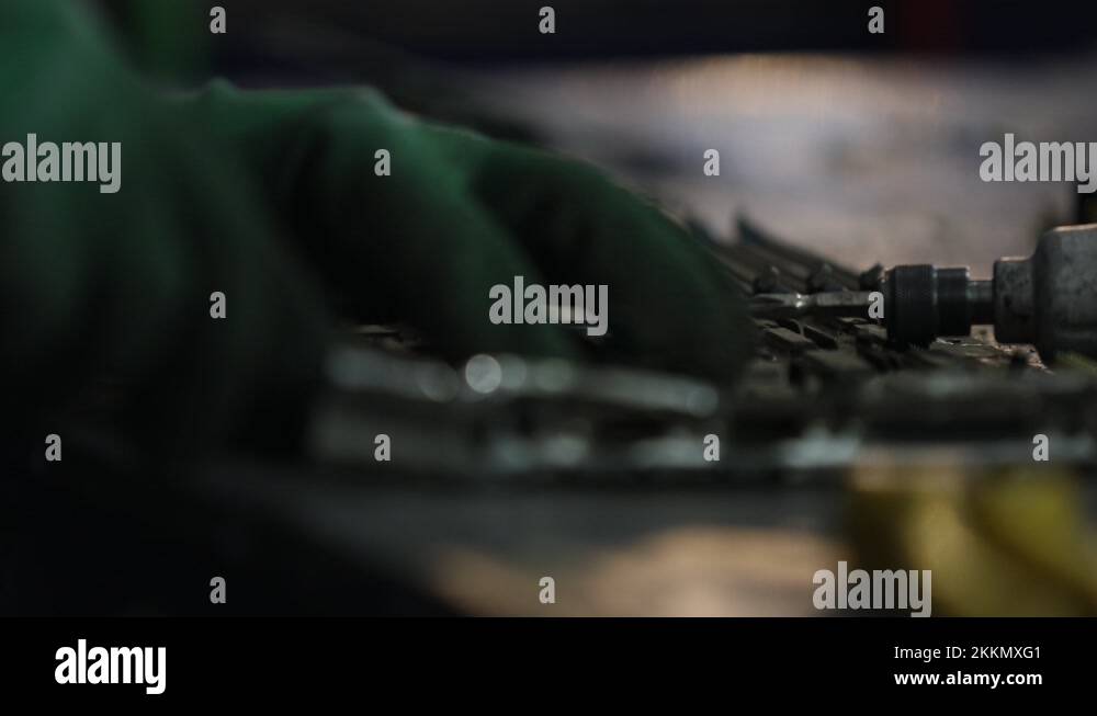 Dismantling obsolete computer parts for scrap or reuse - isolated close ...