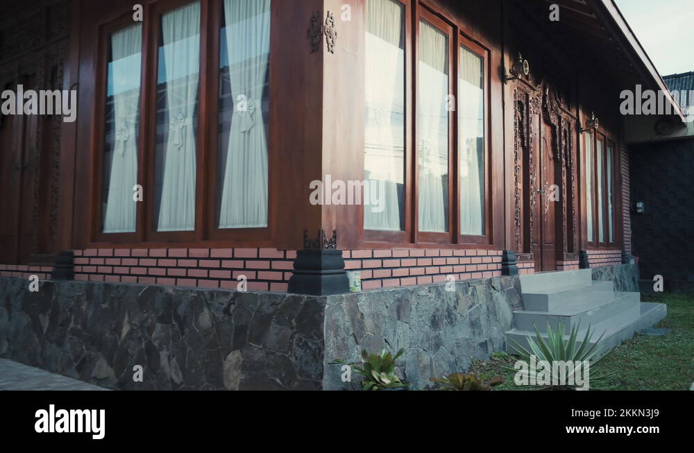 Java JOGLO wooden house design view with partial bricks wall and ...