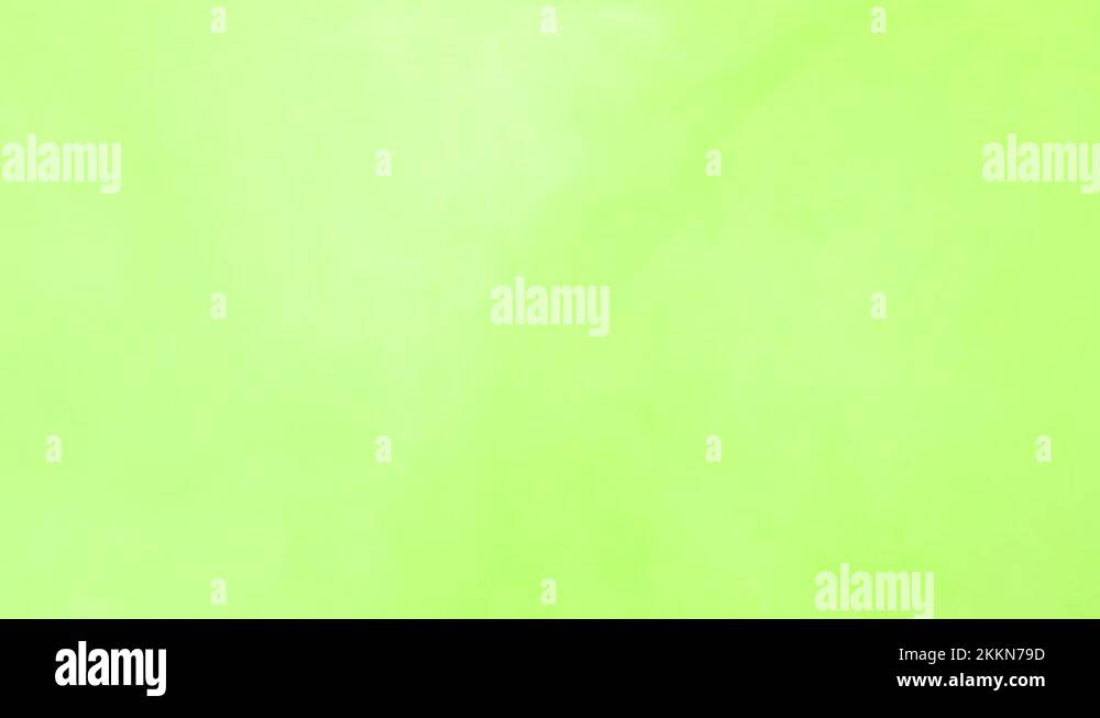Green ink spreading in water on white background. Green screen smoke ...