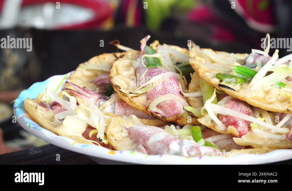 Squid pancake Stock Videos & Footage - HD and 4K Video Clips - Alamy