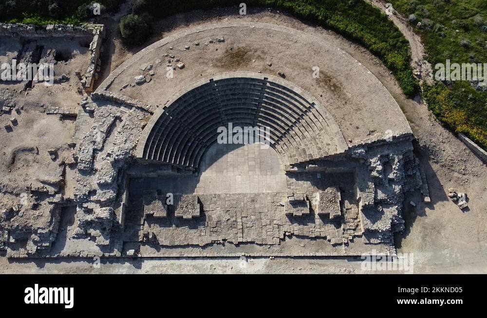 Wide aerial view of an ancient Greek Odeon, amphitheater. Top-down ...