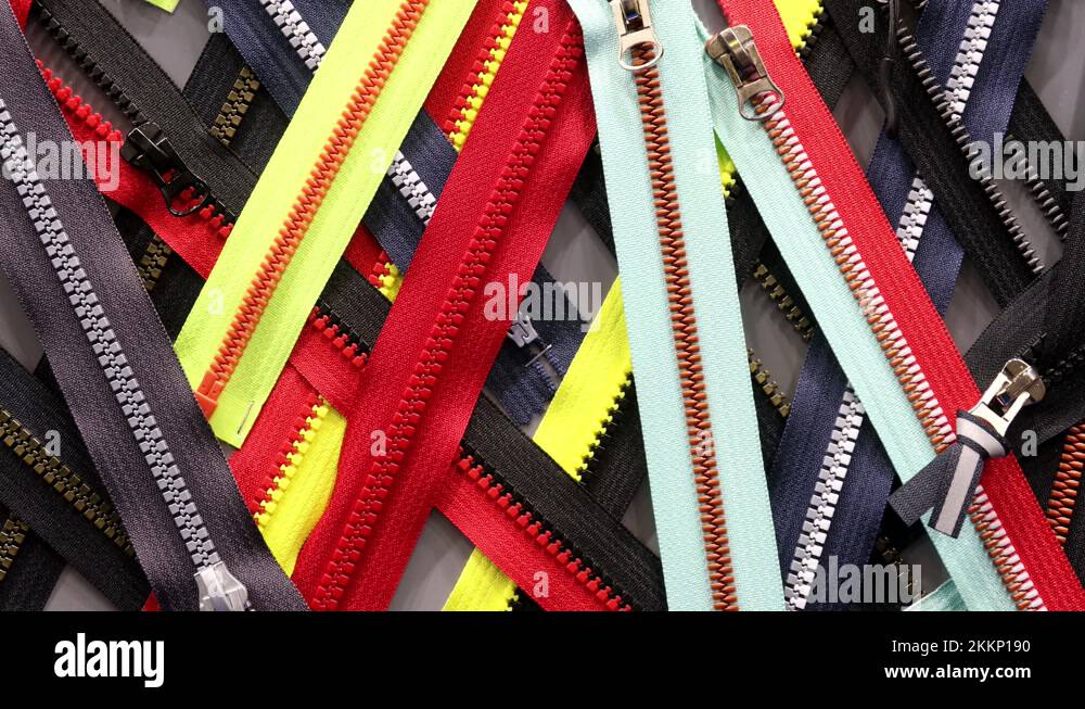 different color, length and type of zipper in the atelier Stock Video ...