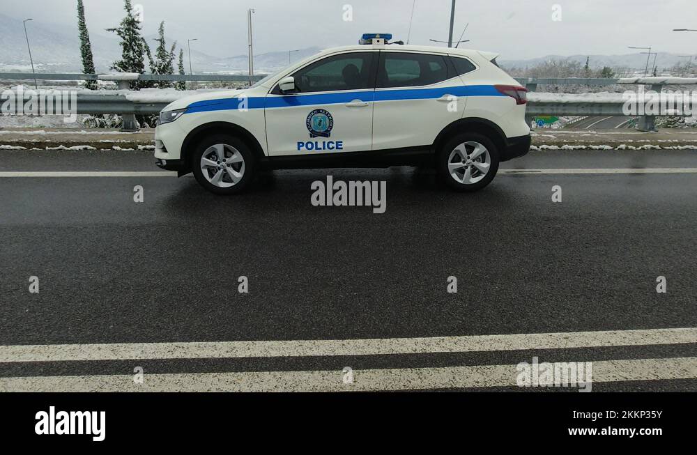 4K Police patrol car during Snow storm Traffic measures BLINKING POLICE ...