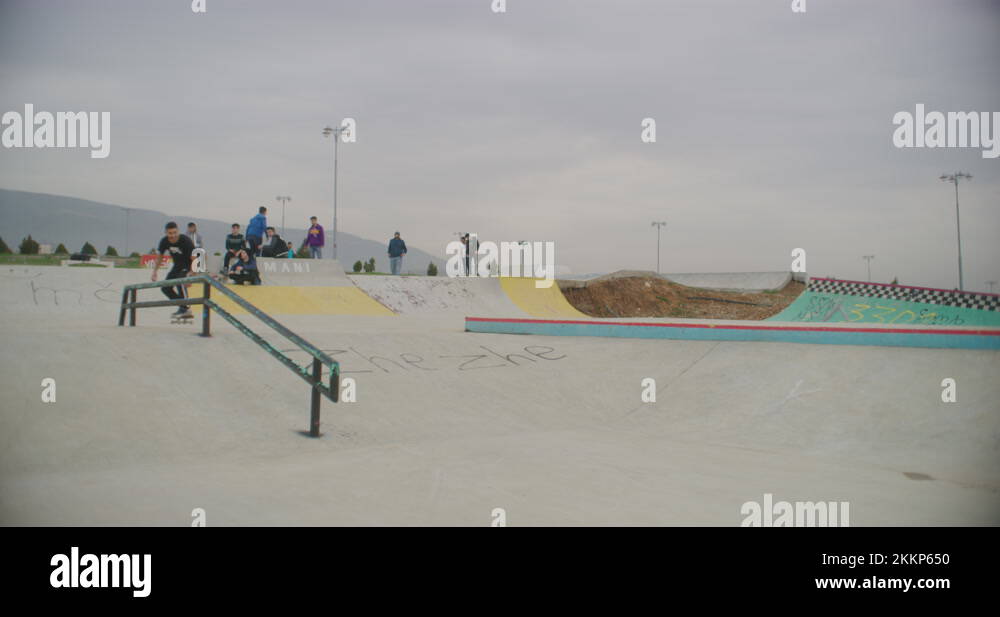 A Skateboarder Tries To Ollie A Gap At The Suli Skate Park in ...