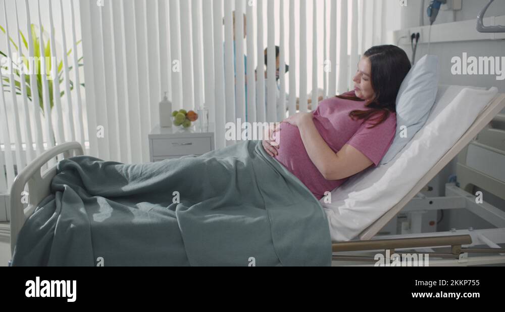 Pregnant young woman lying Stock Videos & Footage - HD and 4K Video ...