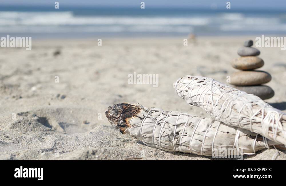 Rock balance on ocean beach, stones stack by sea water waves. Pyramid ...
