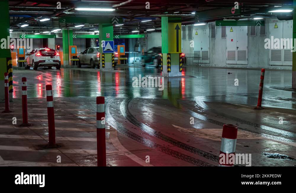 Entry and exit of cars from underground Parking lot of shopping mall ...