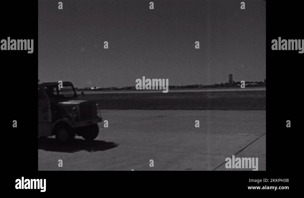 1960s: Jeep pulls U.S Air force fighter jet on runway. U.S. Air force ...