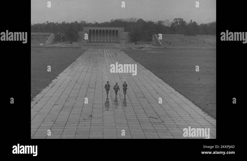 1940s: Nazi rally. Men march. Men stand at attention under U.S. flag ...