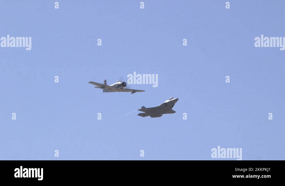 F-35A Lightning II and A-1 Skyraider fly side by side during ...