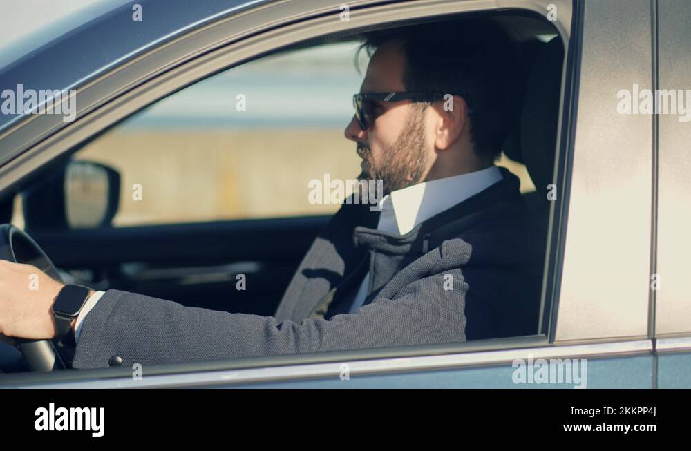 Driver Turning Steering Wheel.Man Driving Car And Holding Wheel Stock ...