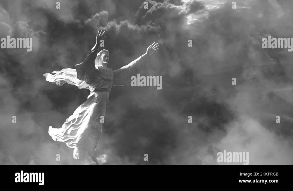 a floating statue of jesus against a backdrop of thunderstorms and ...