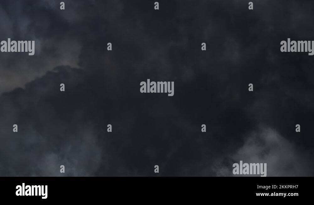 thunderstorms and flashes of lightning in the dark cumulonimbus clouds ...