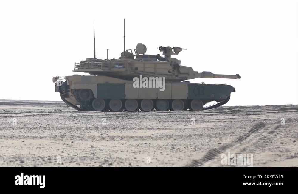 Battle tank turret rotating during exercise Iron Union in UAE desert ...