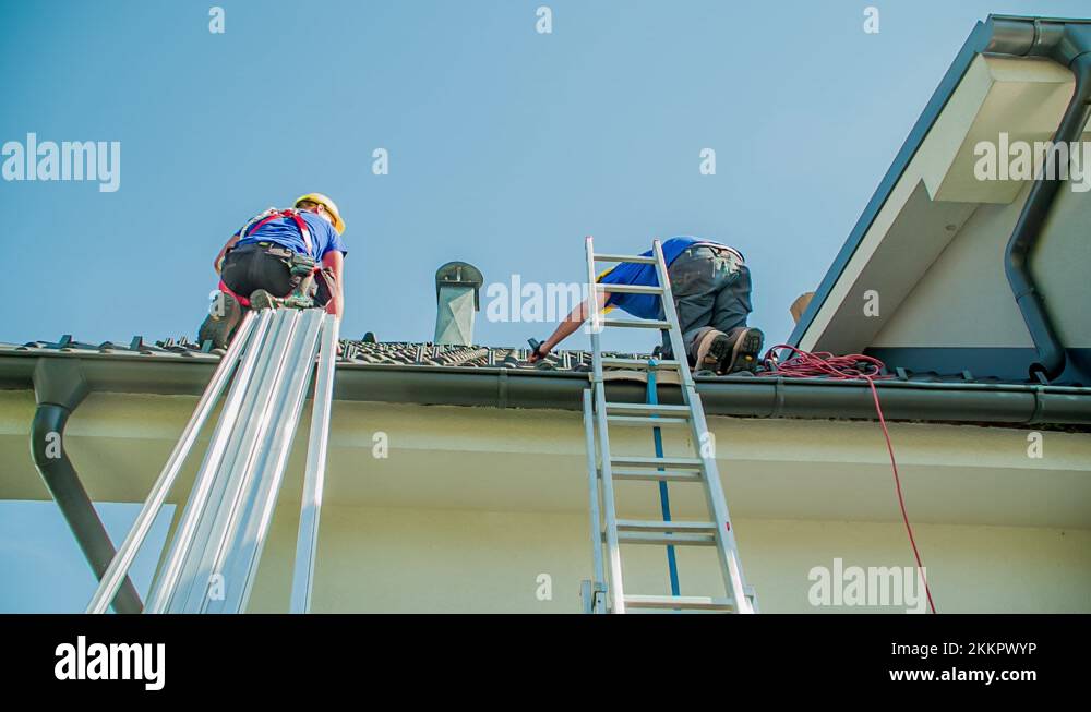 Ladder on roof tiles Stock Videos & Footage - HD and 4K Video Clips - Alamy