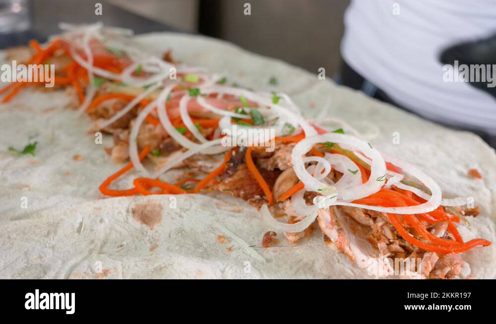 Professional chef is making shawarma at fast food cafe, close-up Stock ...