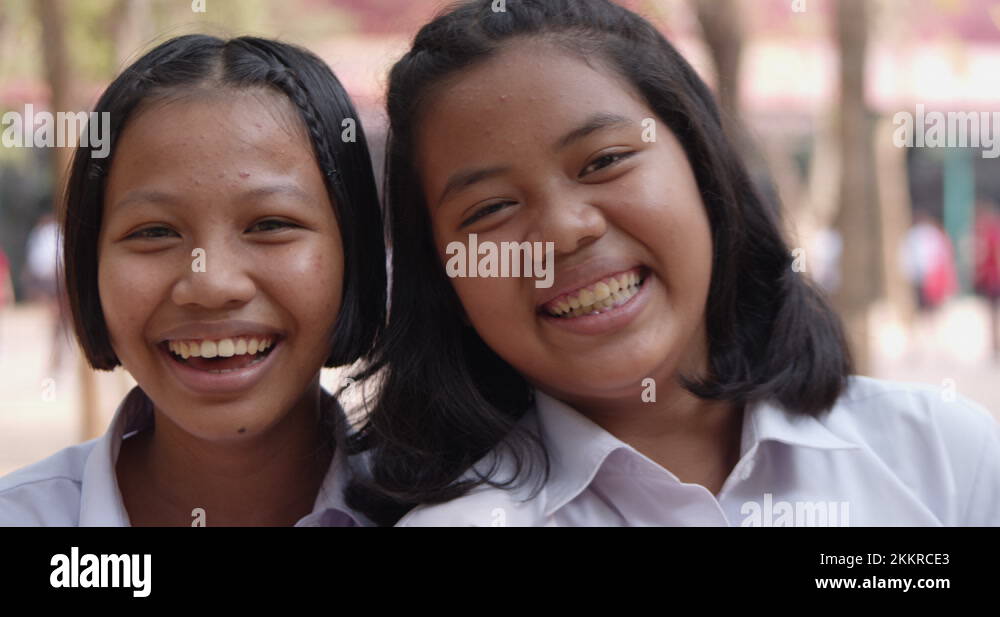 two young native Asian female student girls Stock Video Footage - Alamy