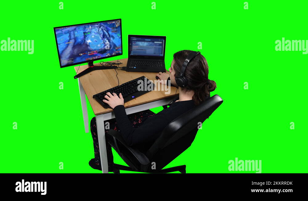 Teenager Gamer Playing Online With Multiscreen On Green Screen, Top ...