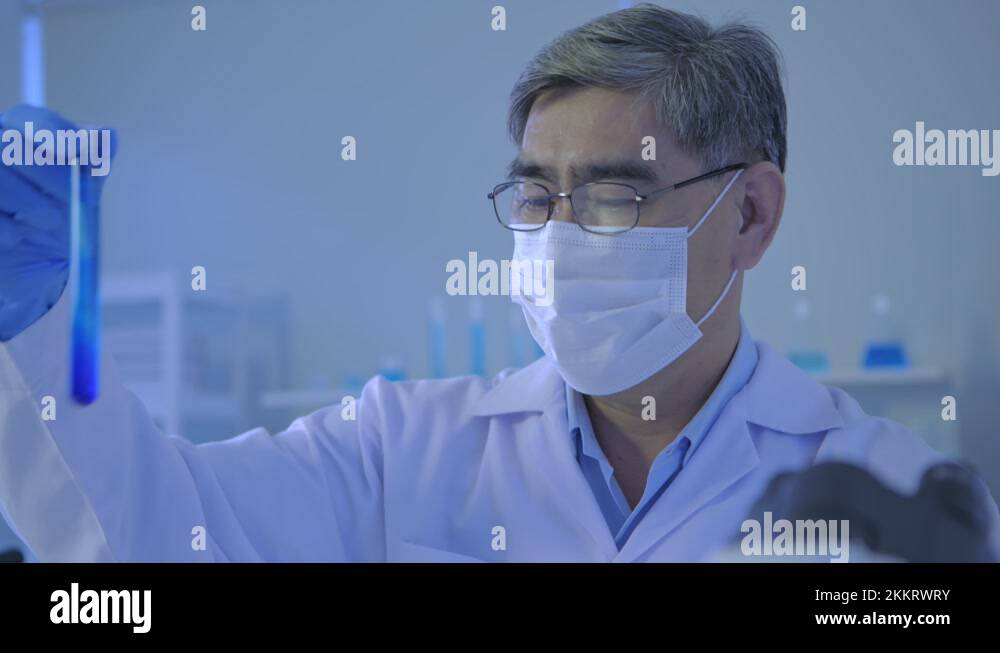 Research concept of 4k resolution. Asian scientists are comparing ...