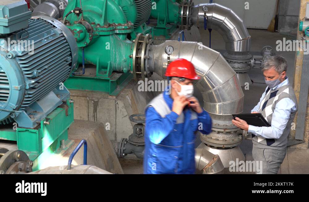 Worker Use Infrared Thermometer to Measure Body Temperature of ...