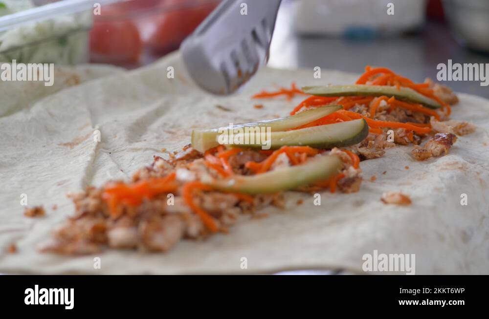 Professional chef is making shawarma at fast food cafe, close-up Stock ...