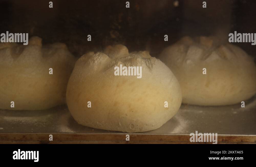 Bakery baking process in factory. Bakery activity. Process of preparing ...