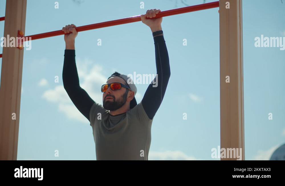 Pullups Workout Outdoors.Muscle Up In Public Gym.Healthy Man Pull-ups ...