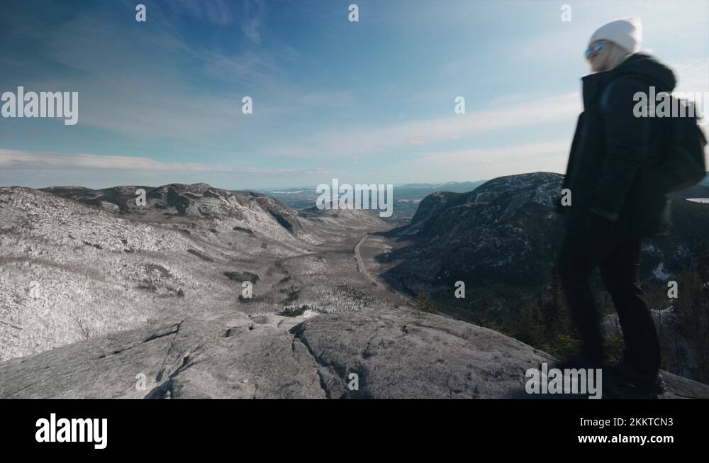 Girl Walking On Top Overlooking View Of Mont Du Dome Mountain In Quebec ...
