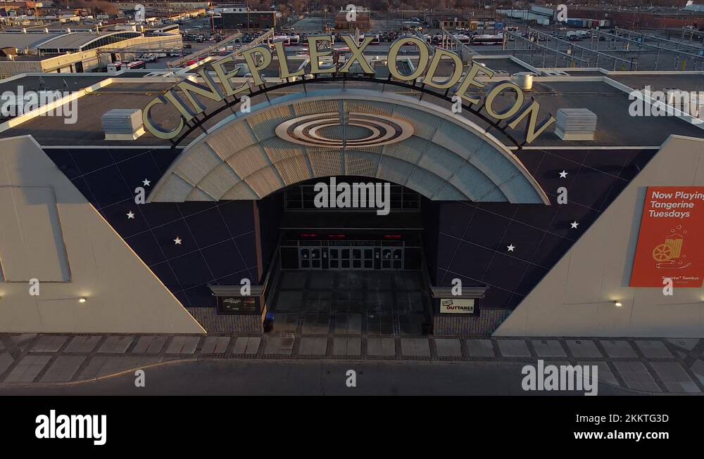 Close up reveal of Cineplex Odeon movie theatre cinema exterior with ...
