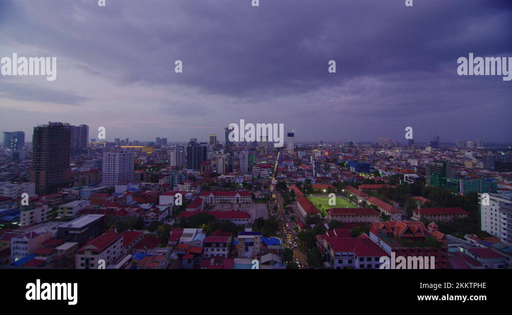 Phnom Penh Skyline And A Busy Intersection In Phnom Penh, Cambodia ...