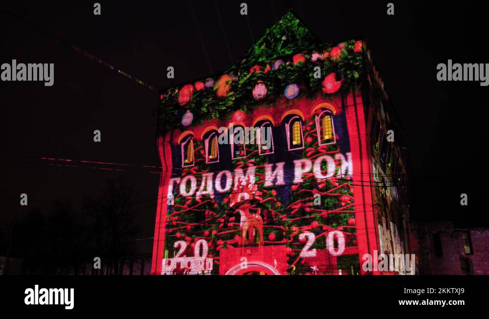 Colorful video mapping show projected on wall of historical building on ...